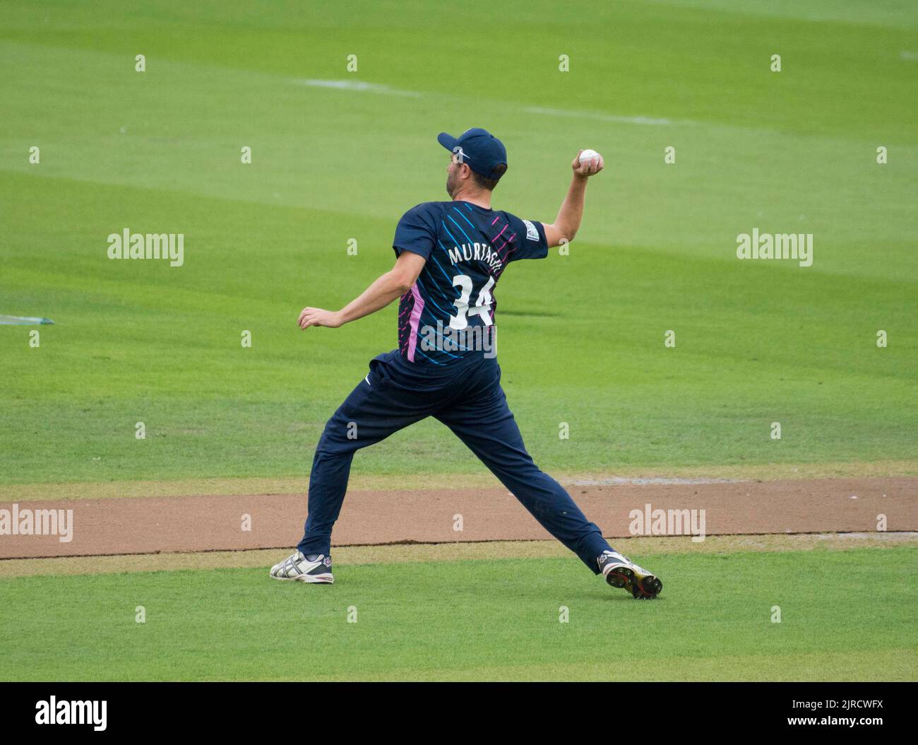 Tim Murtagh fields at Mid-Wicket at the Hove County Ground Stock Photo ...
