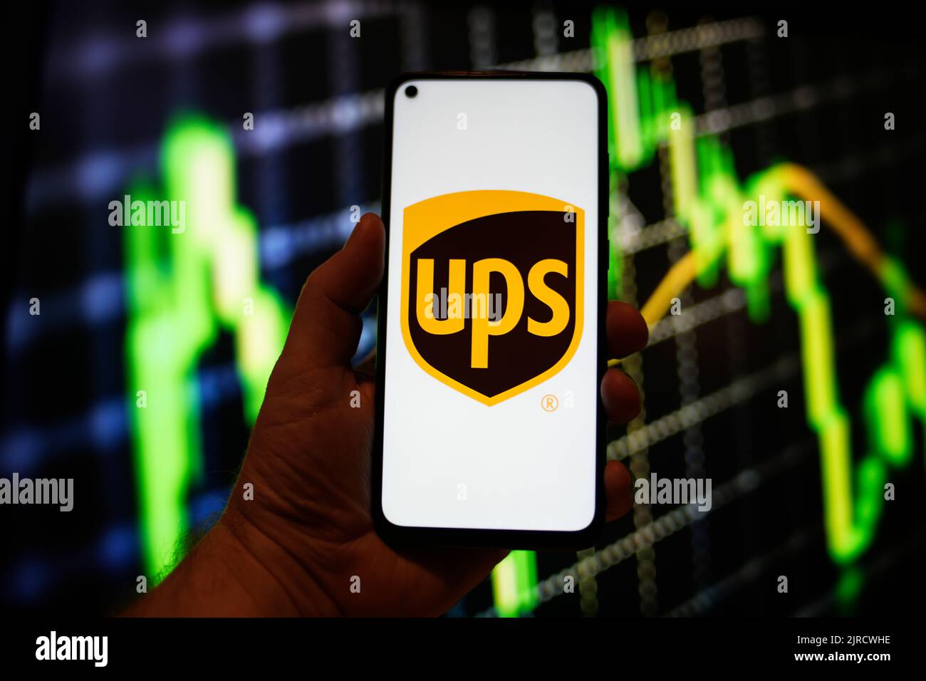 The UPS logo is seen on a Redmi phone screen in this photo illustration ...