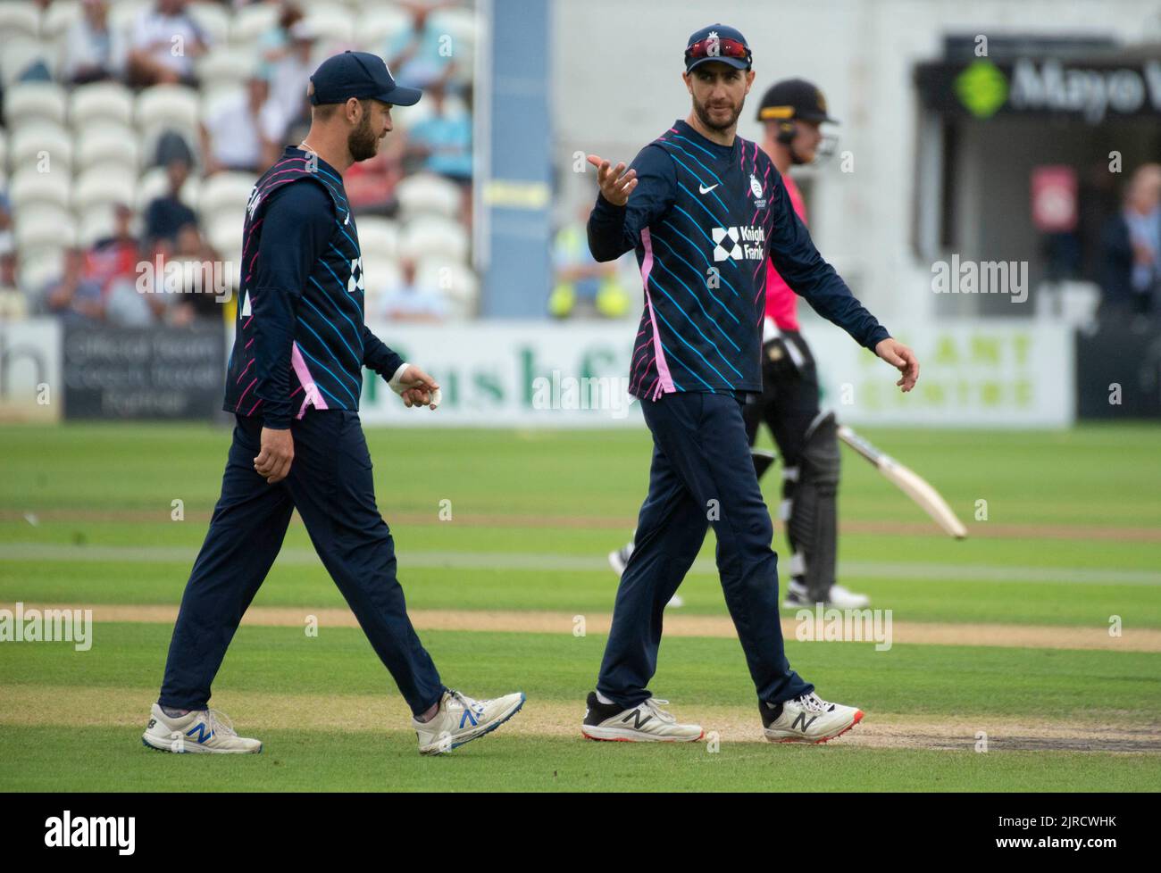 Stephen Eskinazi and Mark Stoneman discuss during Middlesex's fielding ...