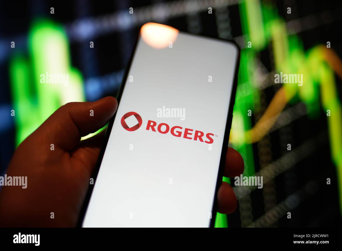 The Rogers logo is seen on a Redmi phone screen in this photo ...