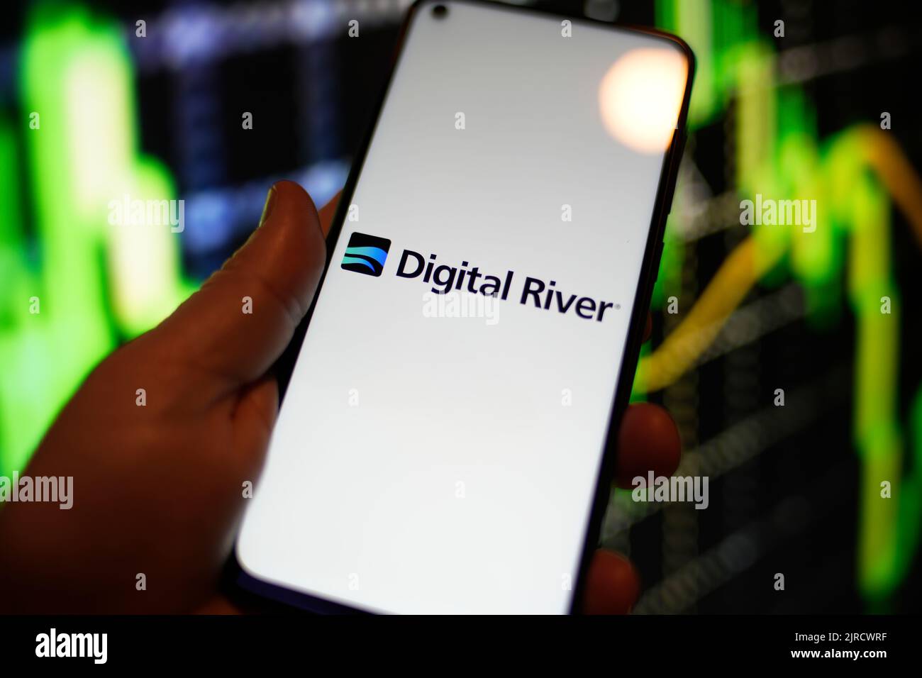 The Digital River logo is seen on a Redmi phone screen in this photo ...