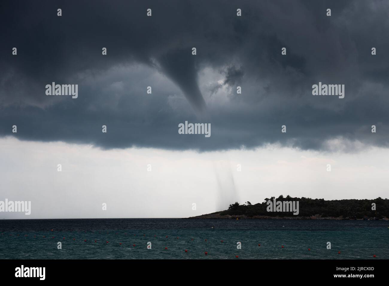 Water Spout typhoon over Halkidiki in greece. Dark stormy clouds Stock ...