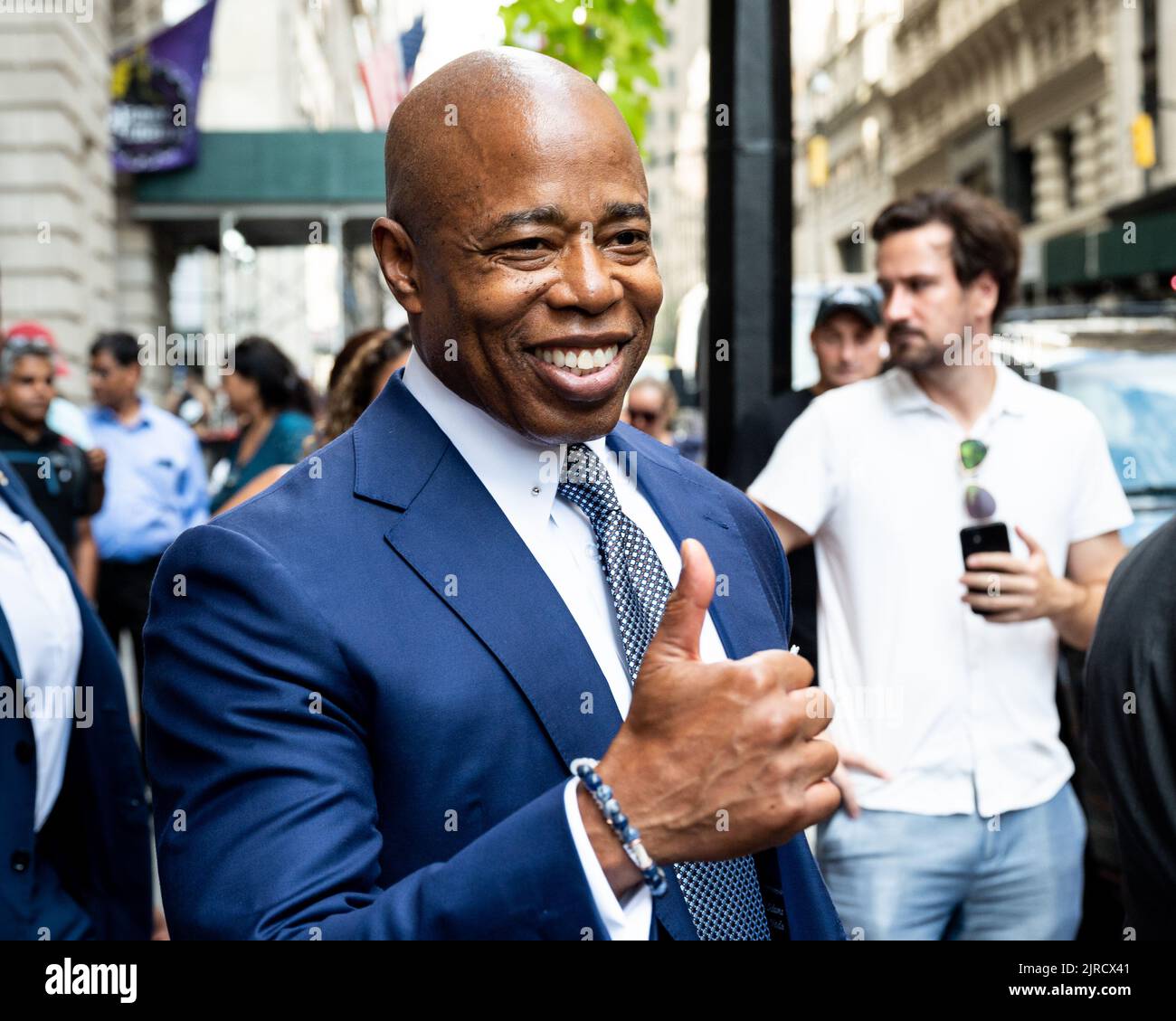 New York City Mayor Eric Adams (D) giving a thumbs-up after the raising ...
