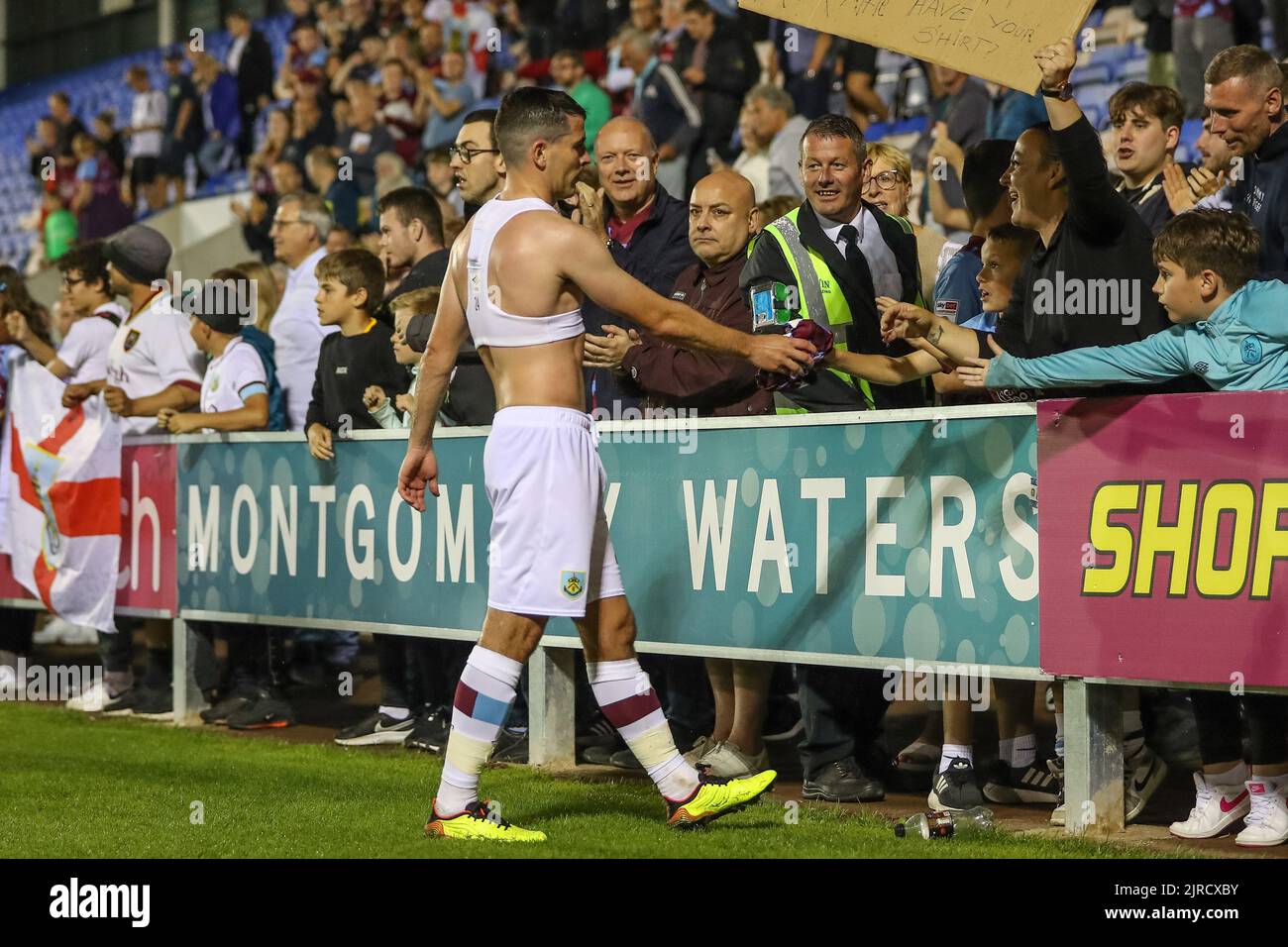 Josh Cullen #24 of Burnley gives his shirt to a fan Stock Photo - Alamy