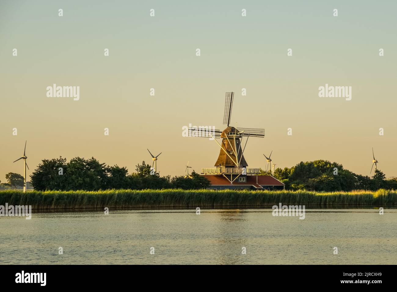 Breezand, Netherlands. August 2022. A Dutch windmill in the polder with ...