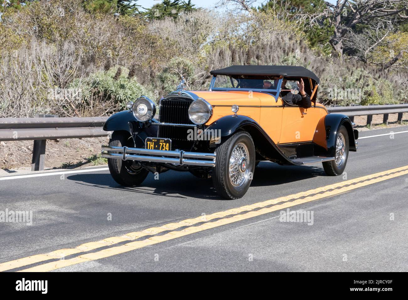 1930 Packard 734 Speedster driving the Pebble Beach tour on HWY1 Carmel ...