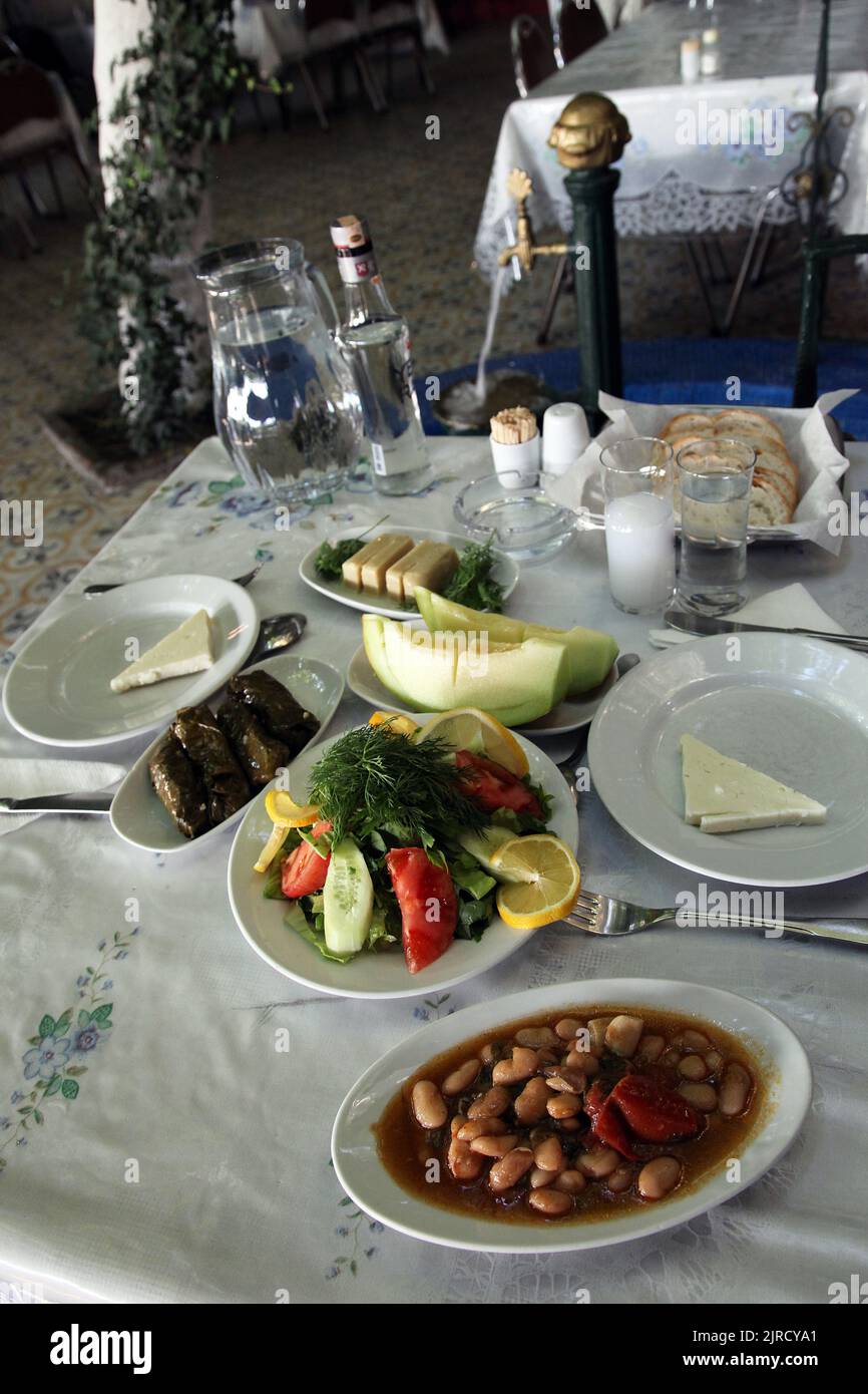 Traditional Turkish appetizer foods (Turkish meze) with raki on the ...