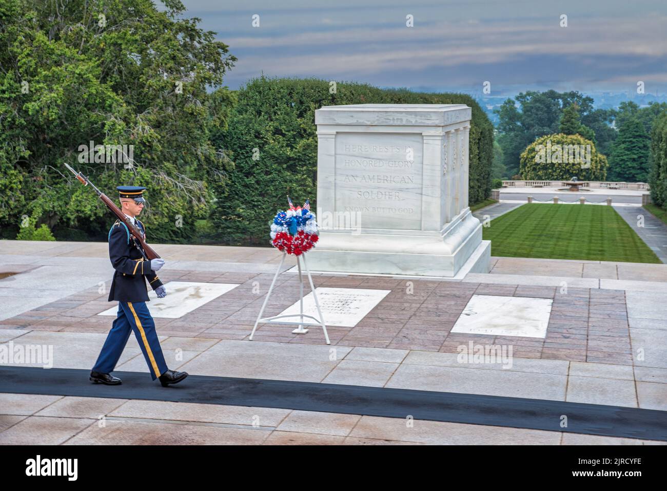 An Honor Guard marches in front of the Tomb of the Unknown Soldier in ...