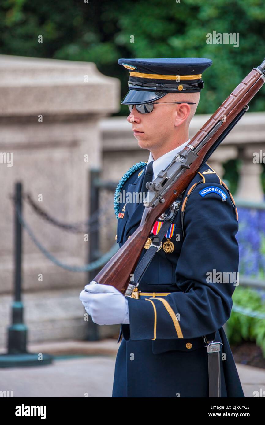 An Honor Guard marches in front of the Tomb of the Unknown Soldier in ...