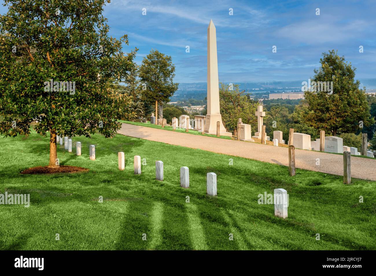 Graves stretch down a hillside overlooking the Pentagon at Arlington ...
