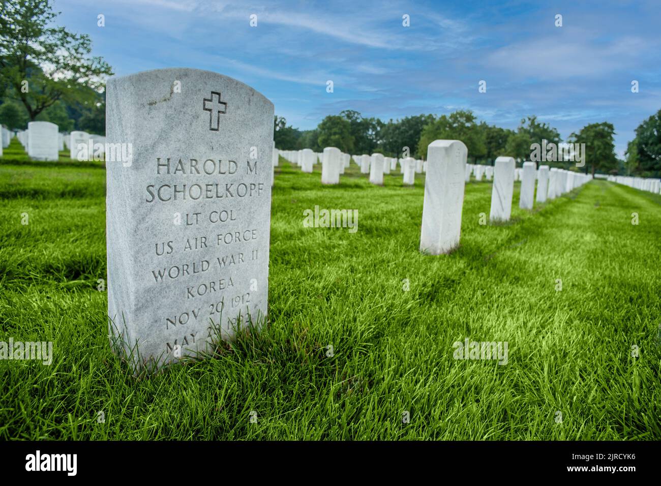 A World War II veteran begins a row of white marble headstone graves at ...