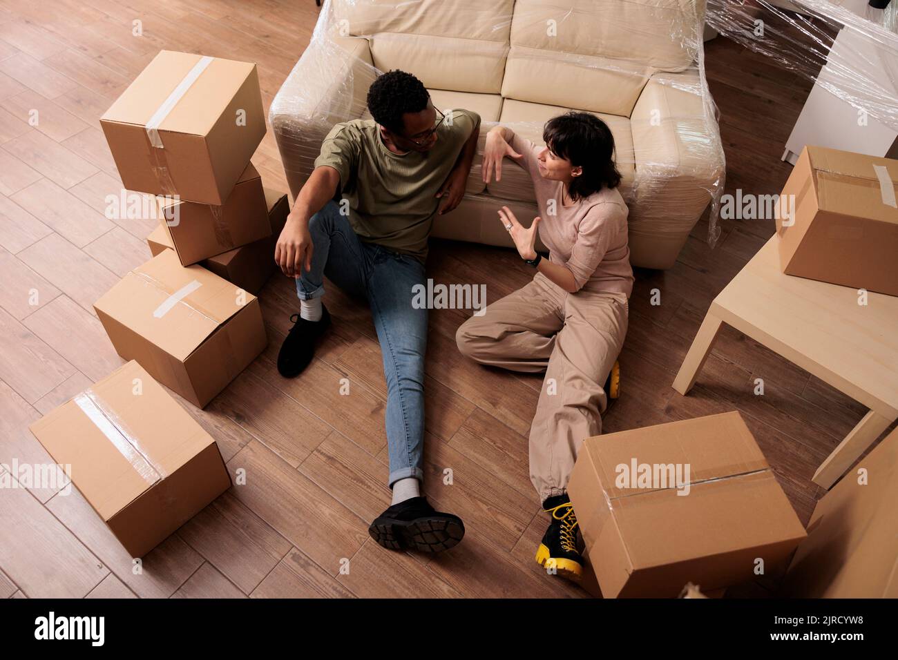 Diverse husband and wife dreaming about new household property ...