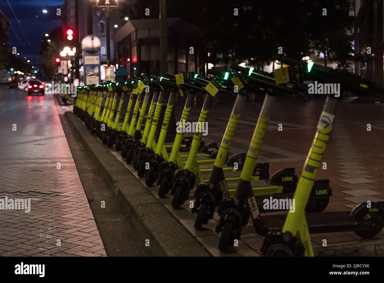 Seattle, USA. 21 Aug, 2022. Dozens of Link EV Scooter lined up downtown ...