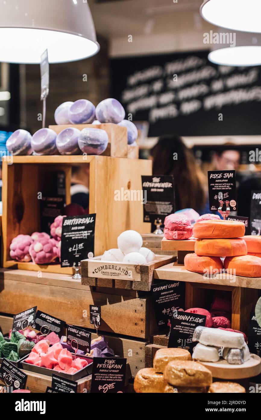 retail shelves with cosmetics, bath products at Lush store Stock Photo ...