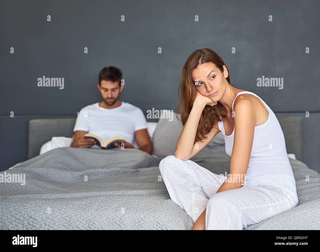 Woman bored couple in bed hi-res stock photography and images - Alamy