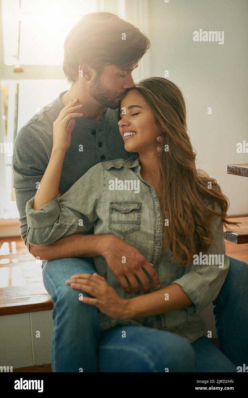 Hold me and never let go. an affectionate young couple holding each ...