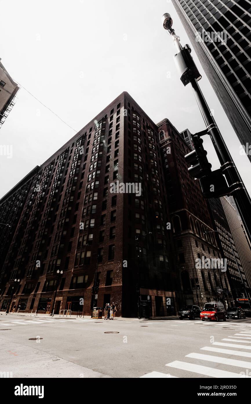 A low angle shot of high downtown huge skyscraper architecture in ...