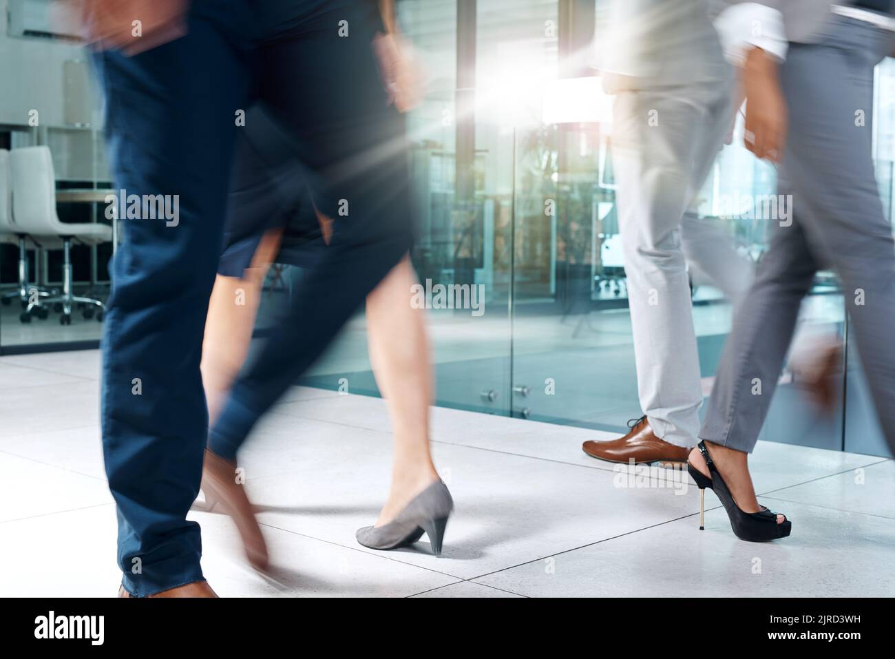 Just another busy day in the office. a group of unrecognizable ...