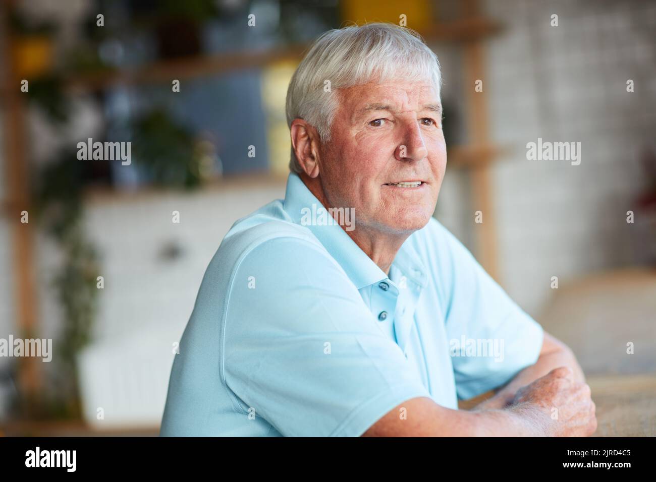 Thinking back on fond memories. a senior man looking thoughtful while ...