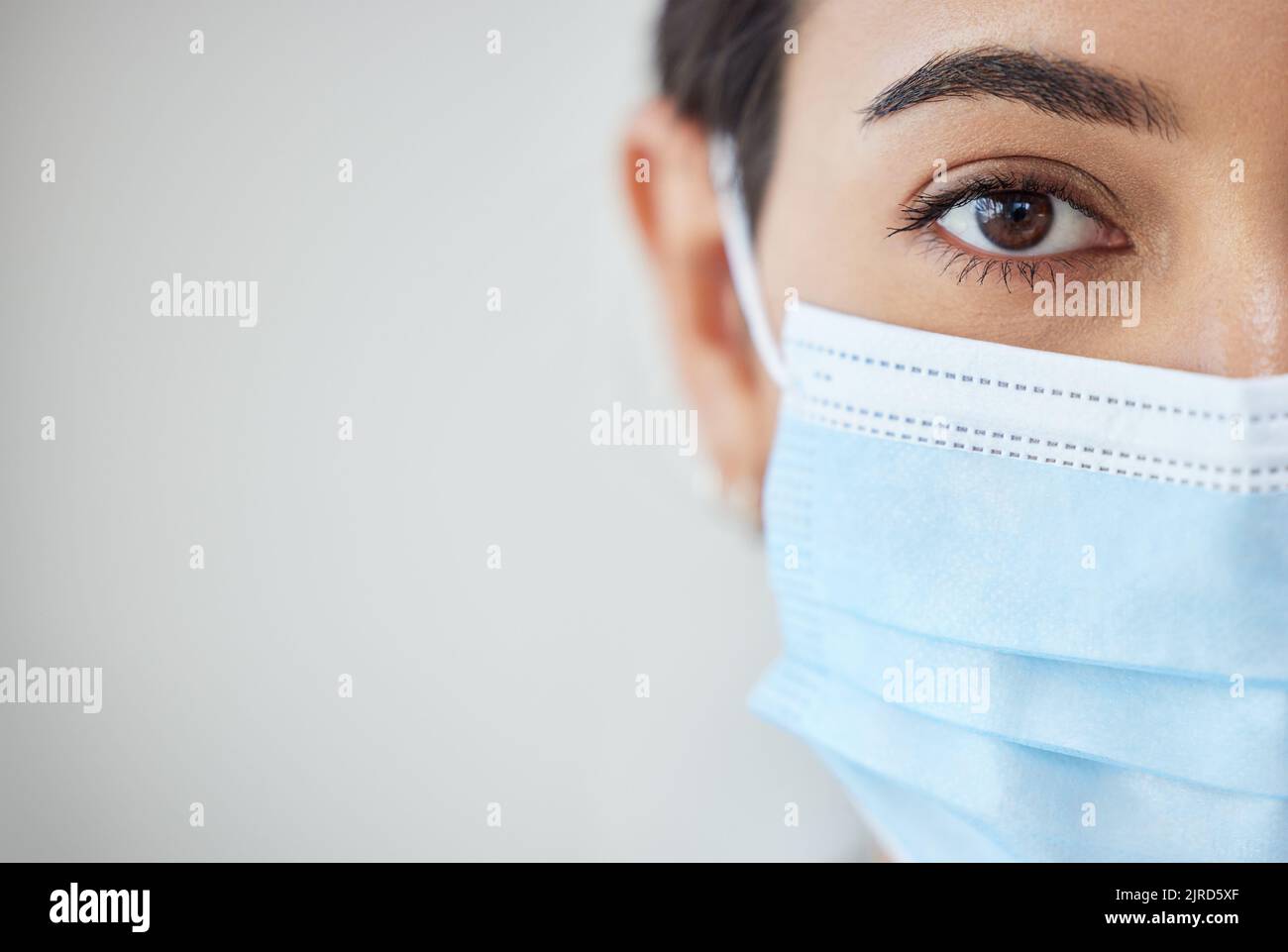 Health, wellness and covid safety mask of a young woman face and head ...