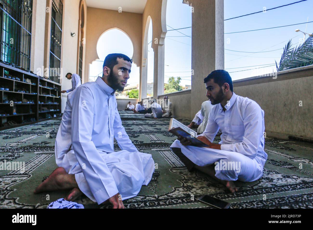 Gaza City, Palestine. 23rd Aug, 2022. Palestinian Muslims read the Holy ...