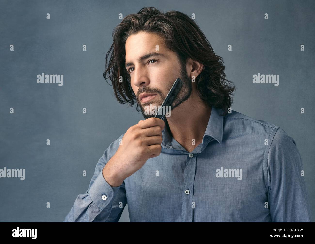 The power of beards is undeniable. Studio shot of a stylishly dressed ...