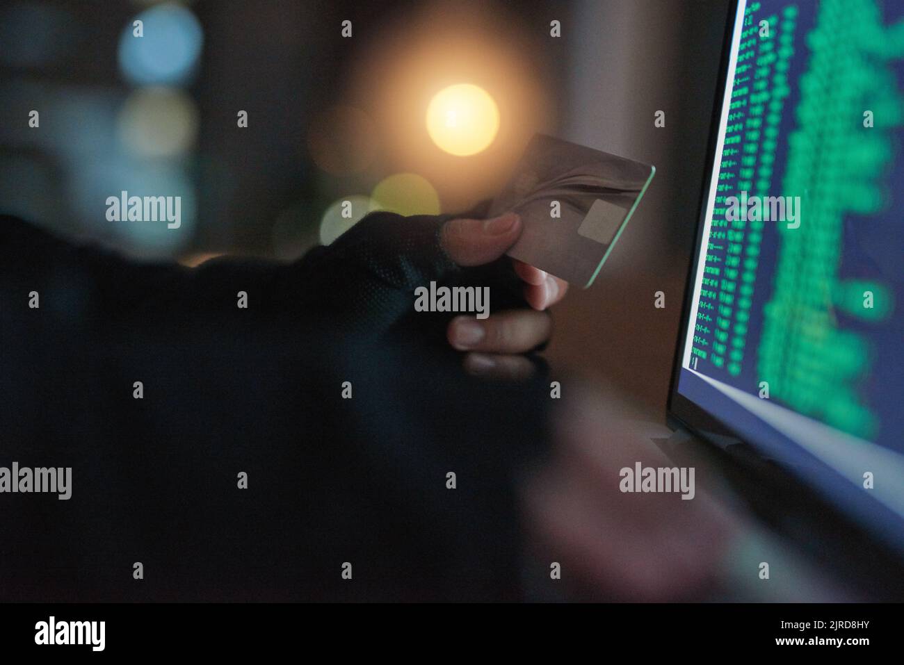 Its easier than you think for thieves to attack. an unrecognisable hacker using a laptop to hack ...