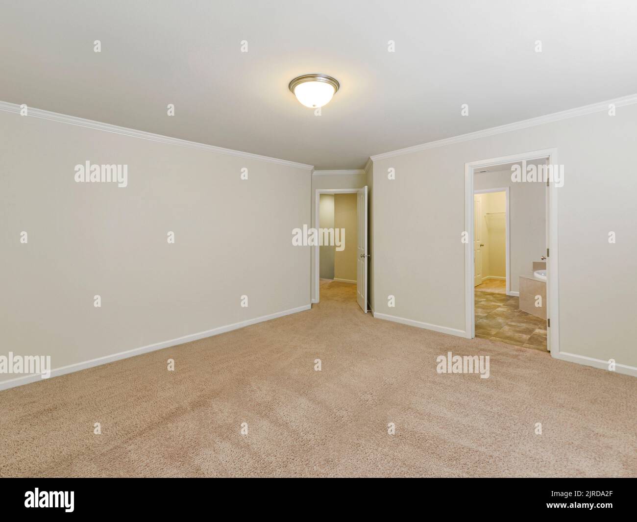 Modern residential empty bedroom interior Stock Photo - Alamy