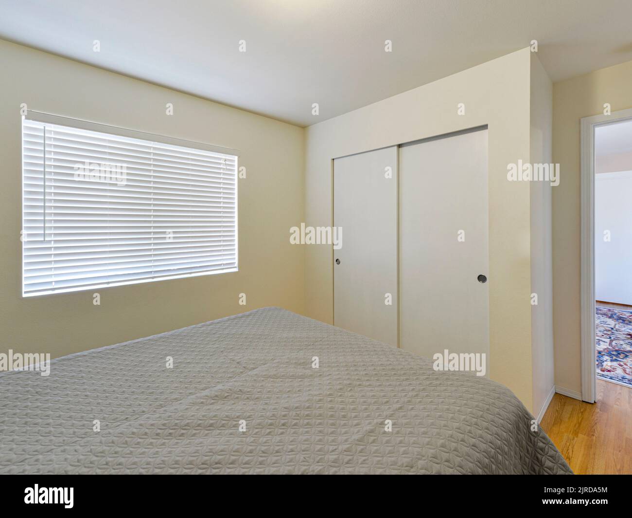 Modern residential empty bedroom interior Stock Photo - Alamy