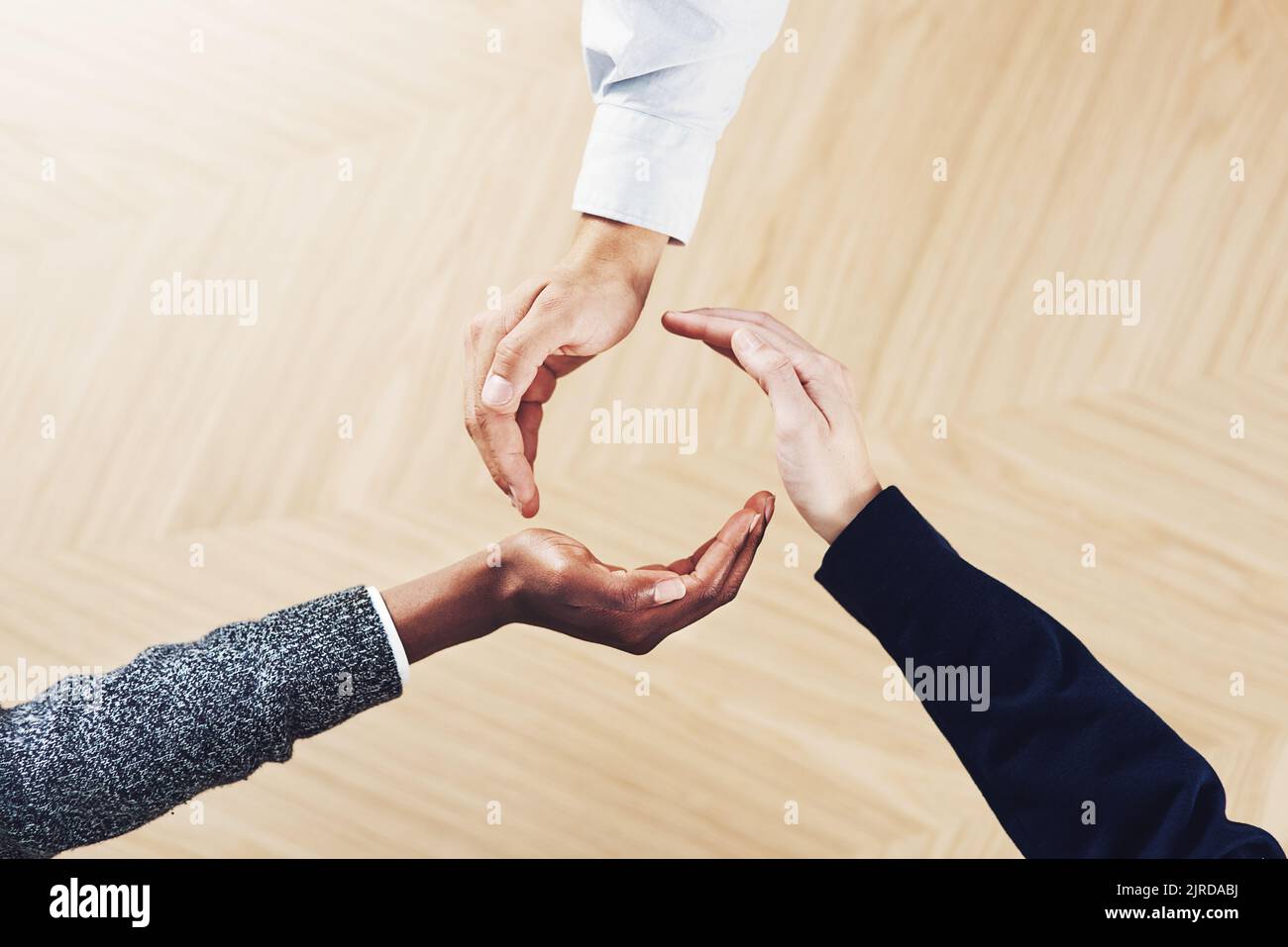 The life cycle of success. High angle shot of a group of unidentifiable ...