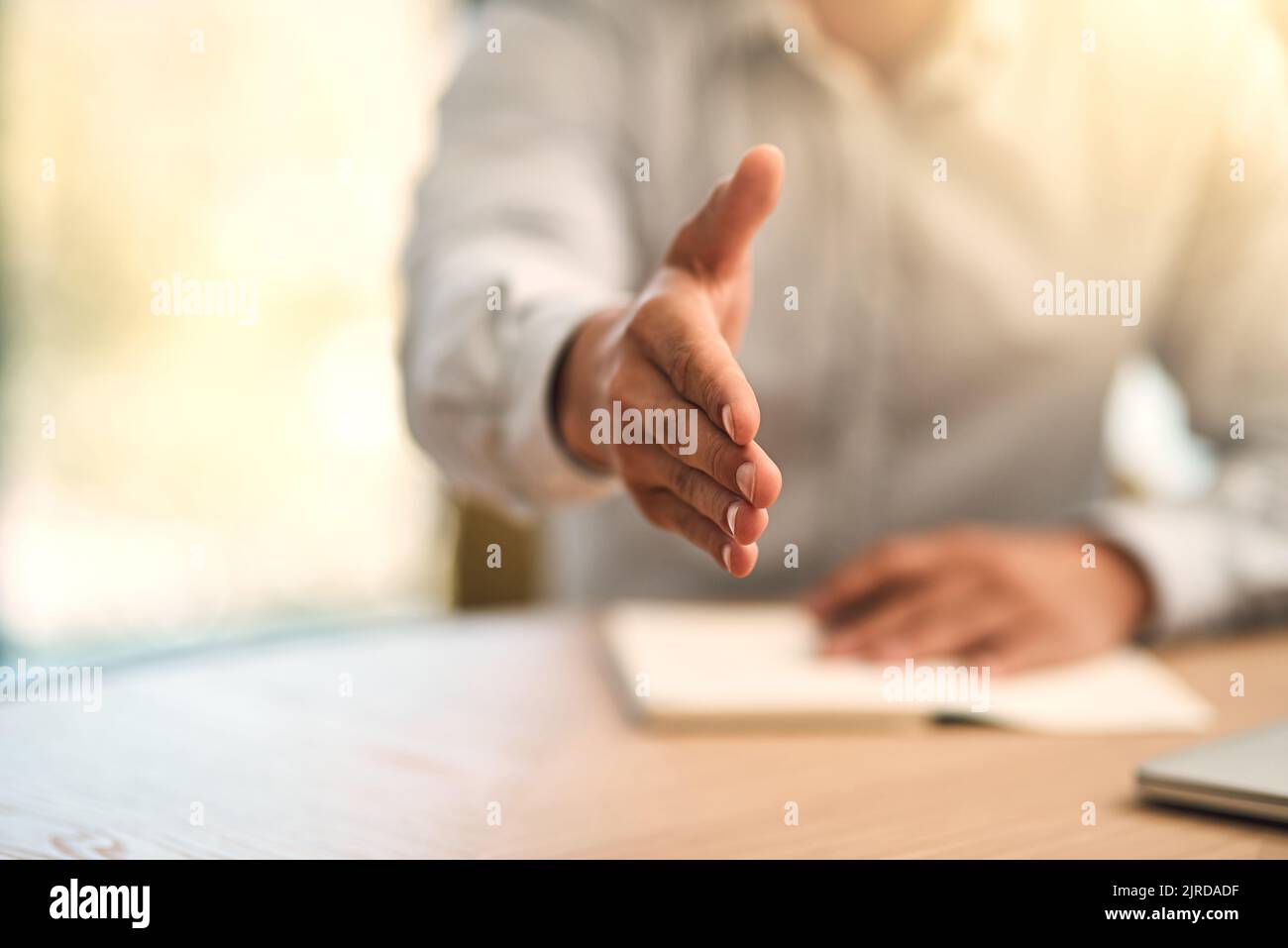 Pleased to meet you. an unidentifiable businessman extending his hand ...