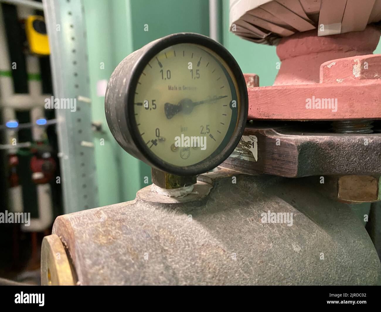 A closeup shot of the old manometer on a tube in the boiler room of a ...