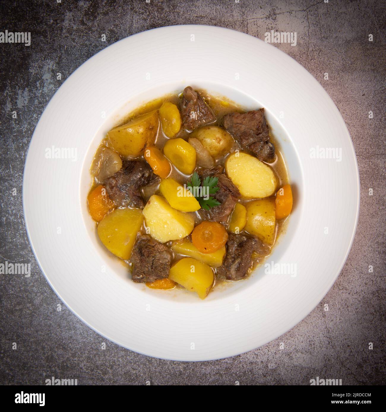 Recipe for beer and mustard beef chuck stew with potatoes, turnips and ...