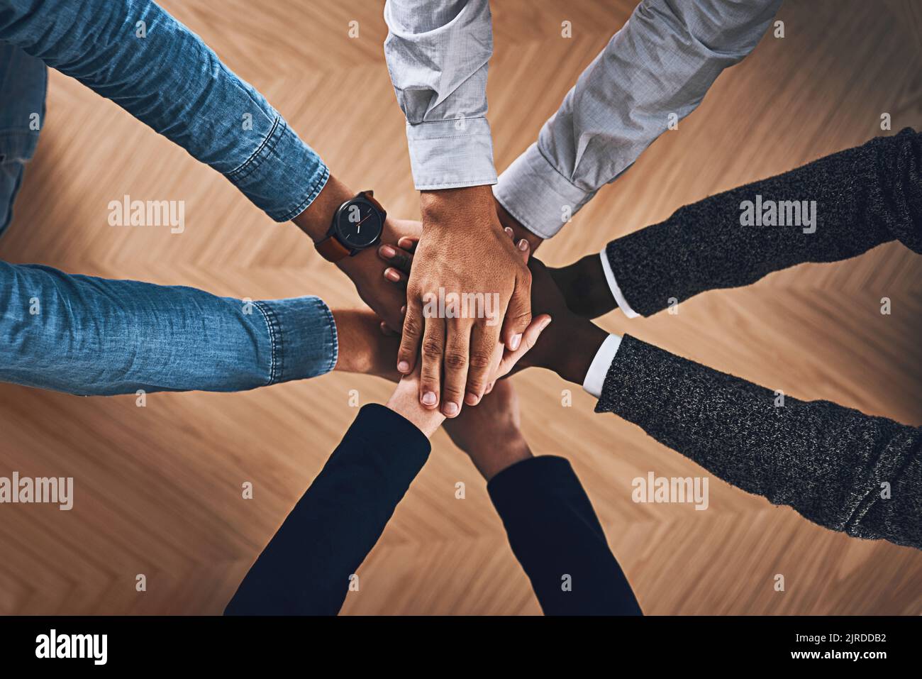 Igniting the spirit of collaboration. High angle shot of a group of ...