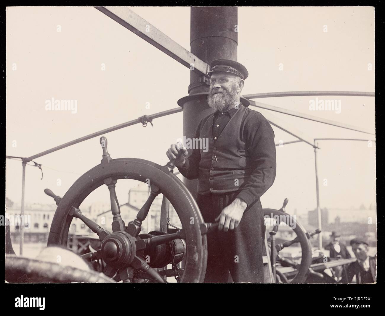 Captain sullivan at the helm captain sullivan at the helm hi-res stock ...