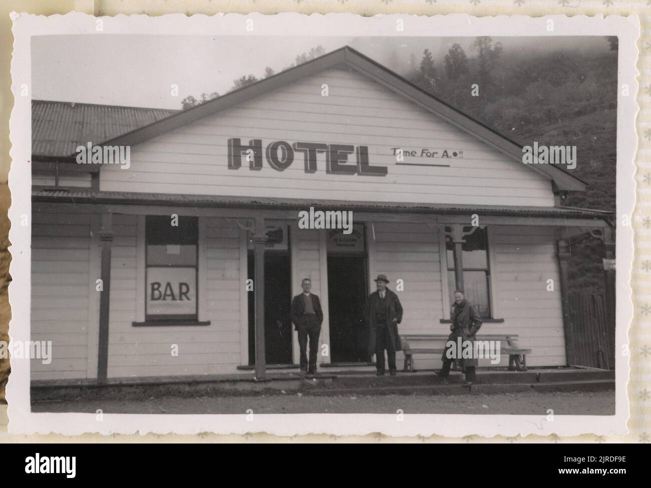 Three men at a hotel. From the album: James Cane photograph album ...