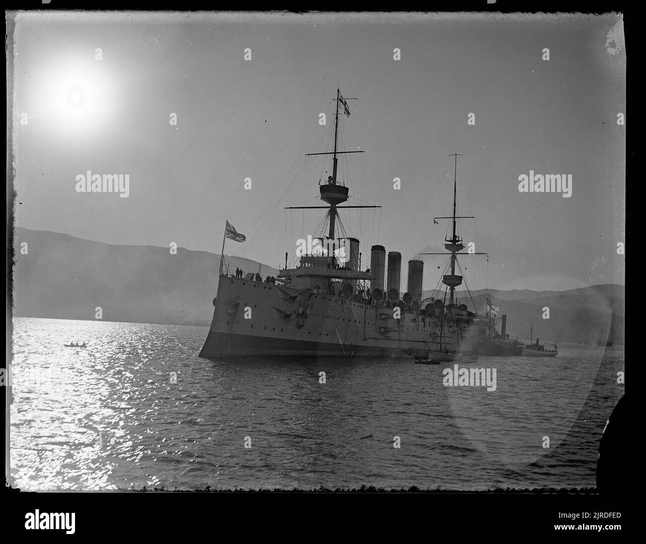 HMS Powerful, New Zealand, by Fred Brockett Stock Photo - Alamy