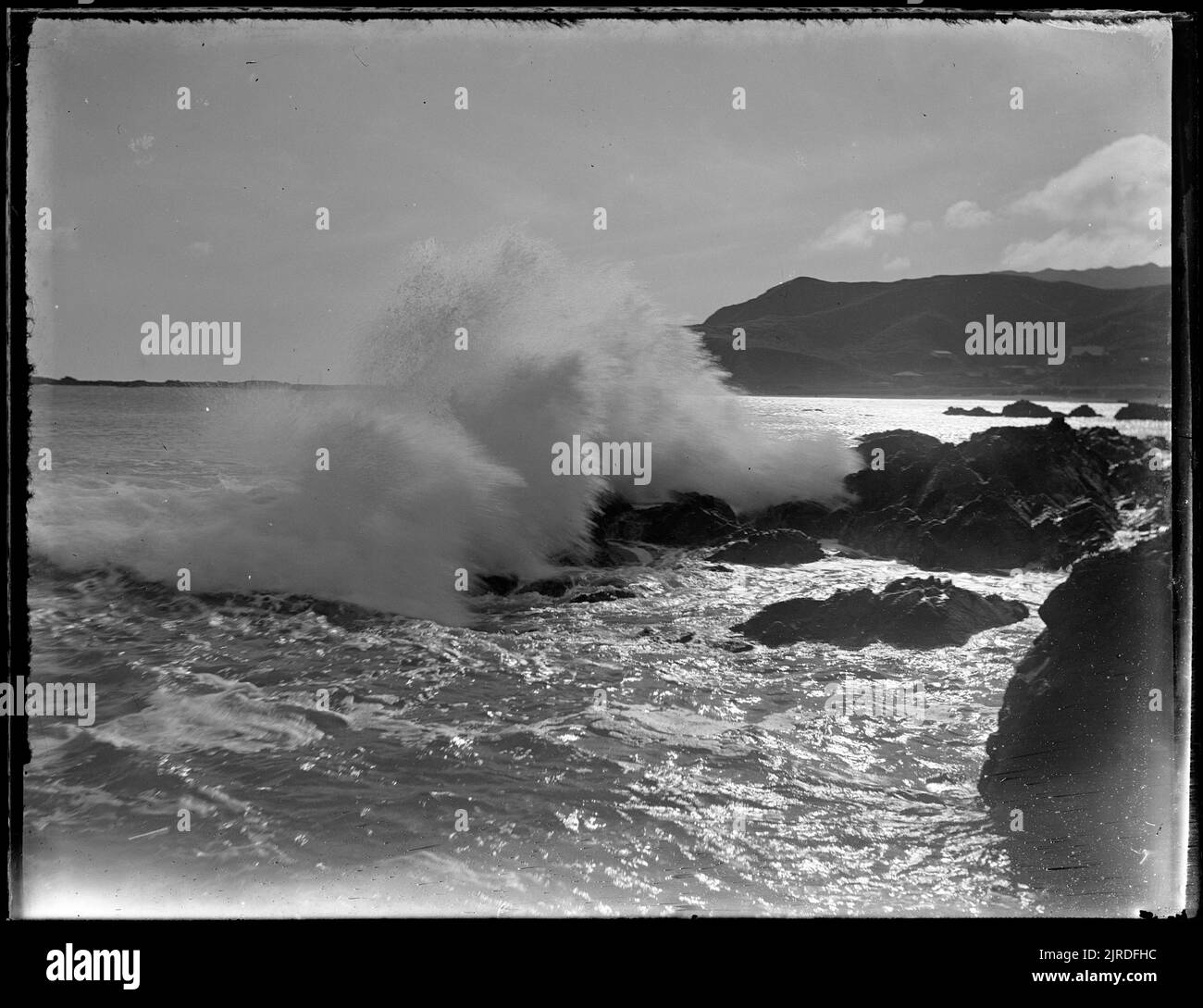 Wave activity, New Zealand, by Fred Brockett Stock Photo - Alamy
