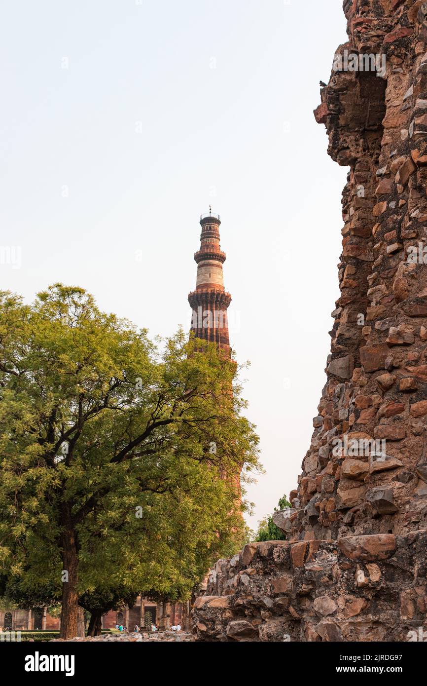 A vertical shot of Qutab Minar tower, a UNESCO world heritage site in ...