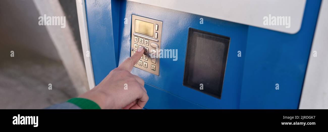 Woman hand typing pin code on ATM keyboard closeup Stock Photo - Alamy