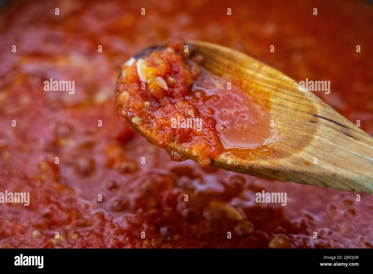 elaboration of tomato sauce and wooden spoon, Mallorca, Spain Stock ...