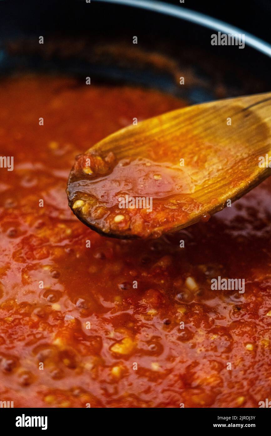 elaboration of tomato sauce and wooden spoon, Mallorca, Spain Stock ...