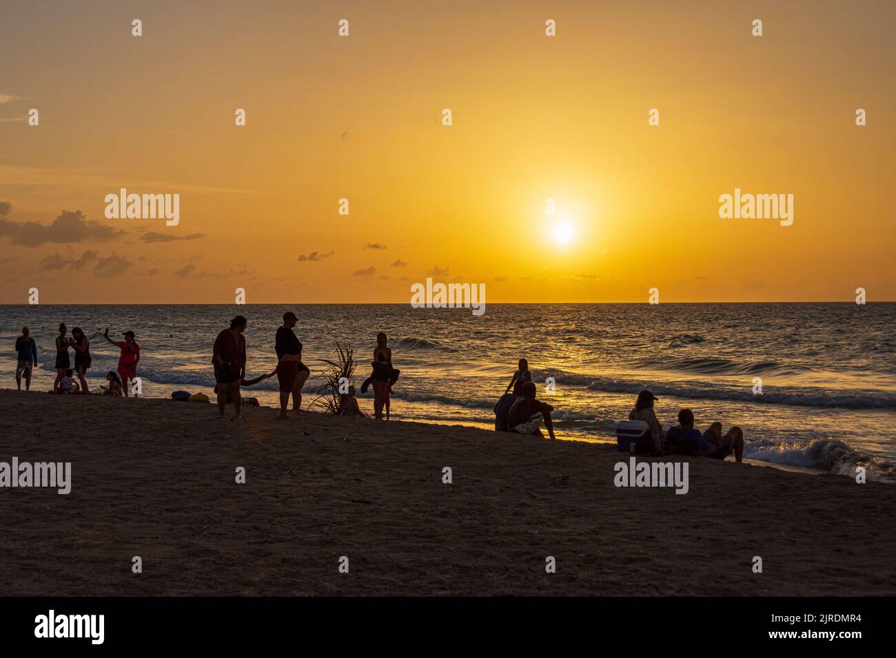 The sun going down under the horizon, Varadero Beach, Cuba Stock Photo ...