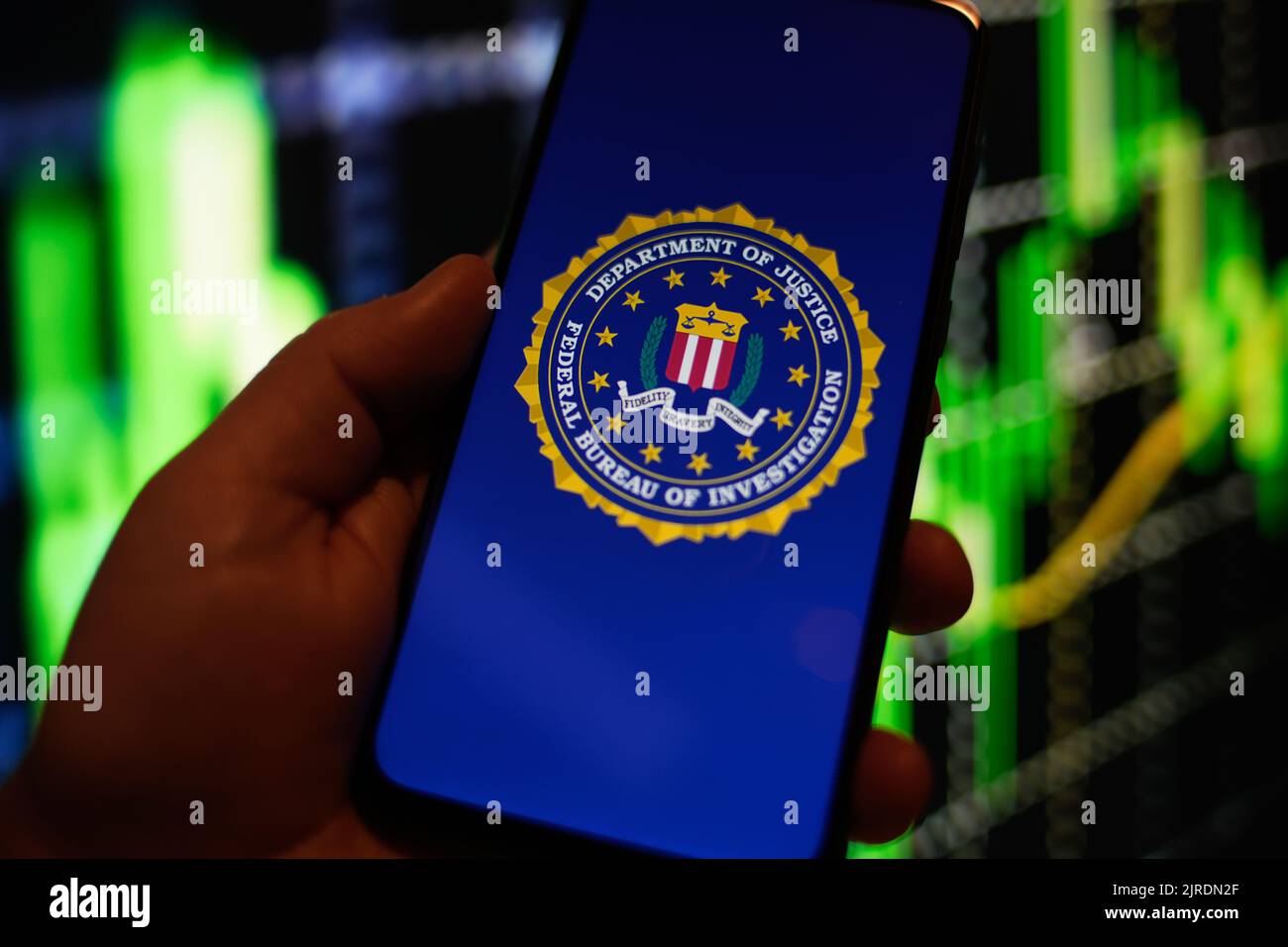 The FBI (Federal Bureau of Investigation) logo is seen on a Redmi phone ...