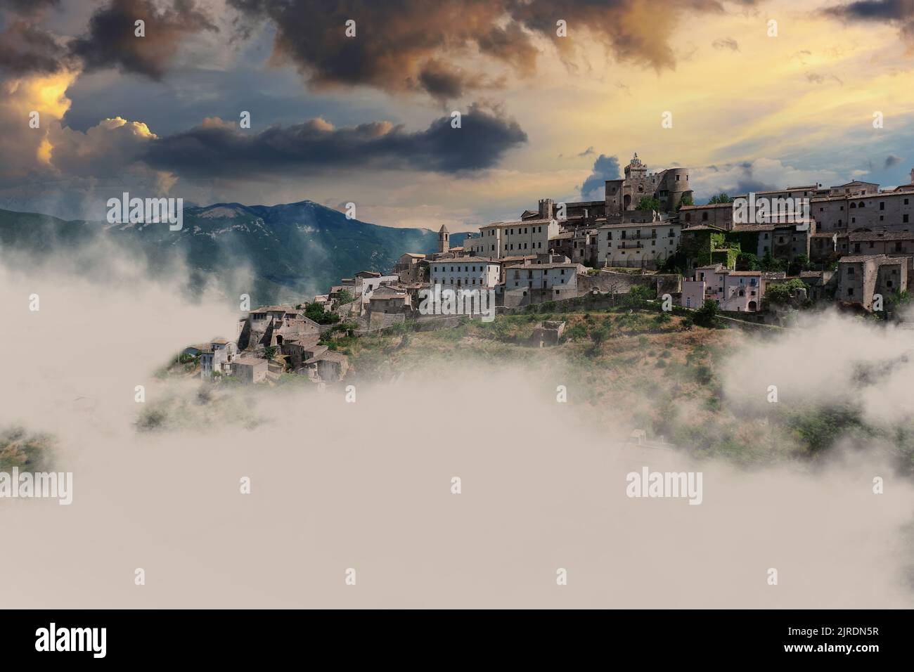 medieval town of capestrano abruzzo shrouded in fog Stock Photo - Alamy
