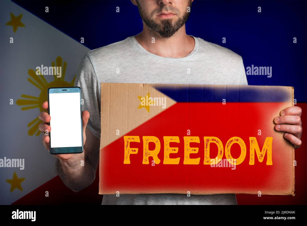 Concept of freedoms and human rights. A man with a cardboard and a ...