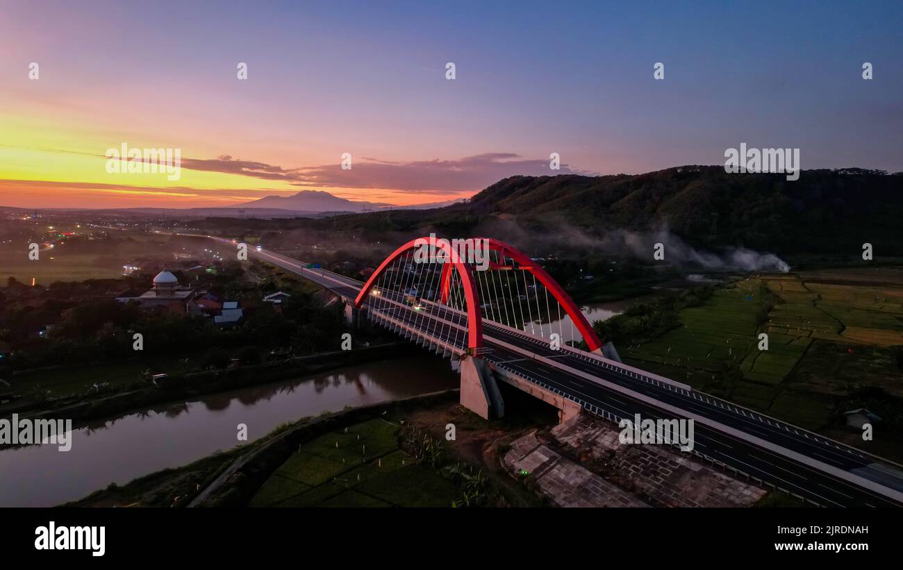 Aerial view of the Kalikuto Bridge, an Iconic Red Bridge at Trans Java ...