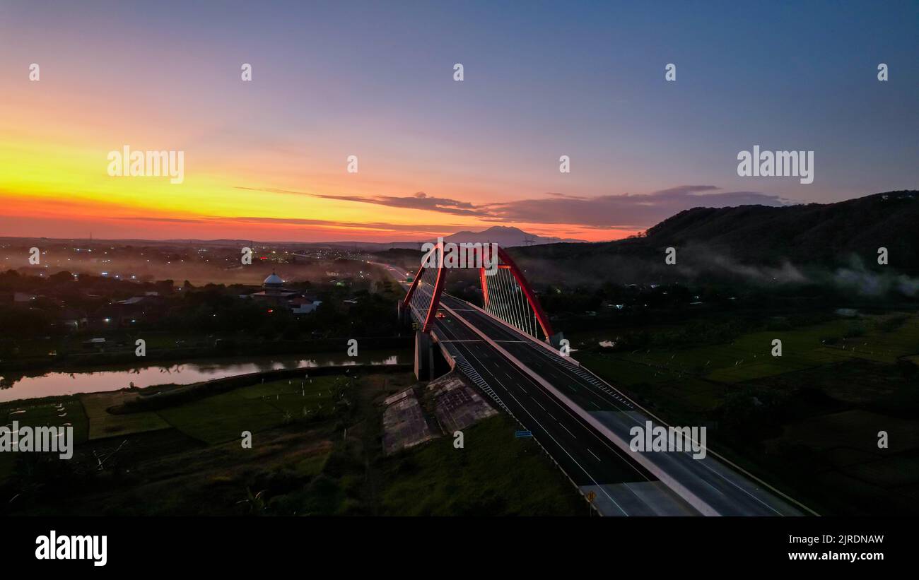 Aerial view of the Kalikuto Bridge, an Iconic Red Bridge at Trans Java ...