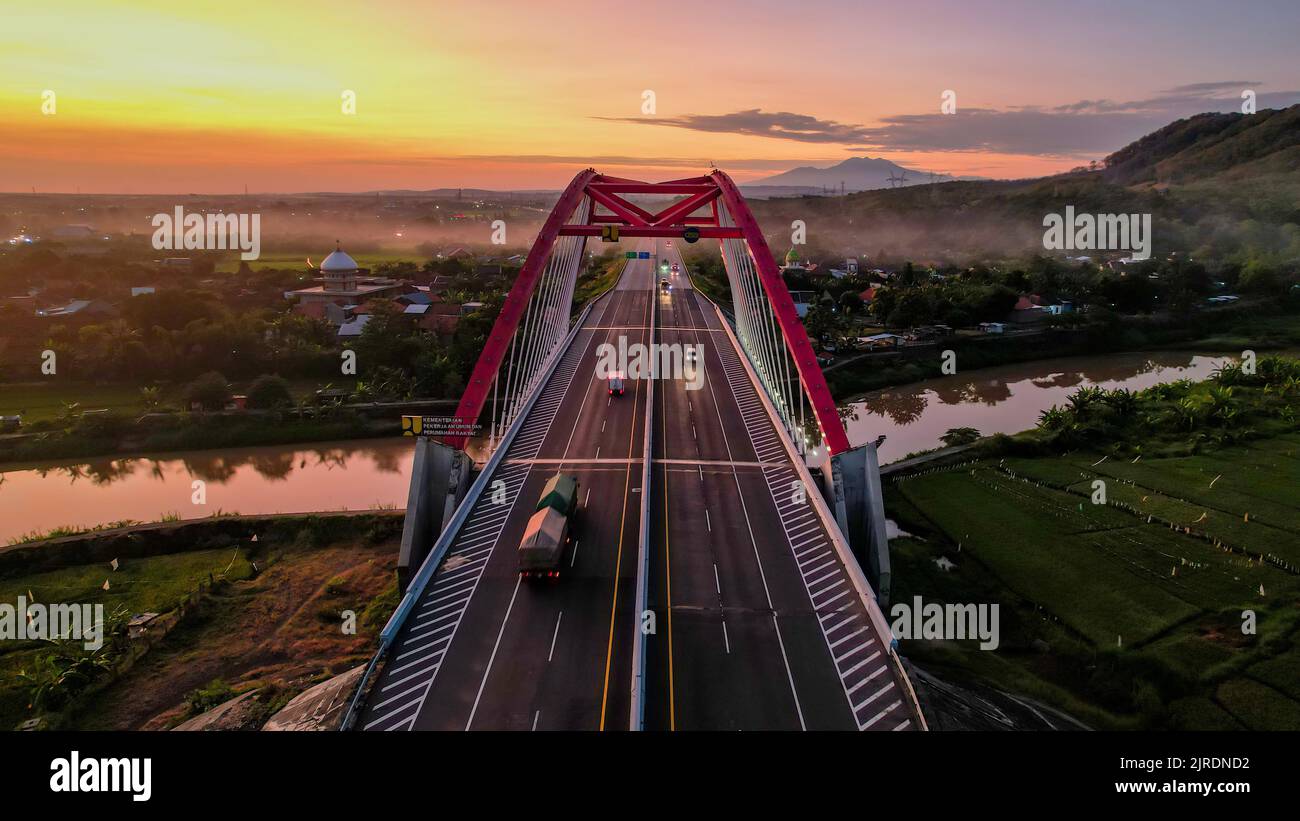 Aerial view of the Kalikuto Bridge, an Iconic Red Bridge at Trans Java ...