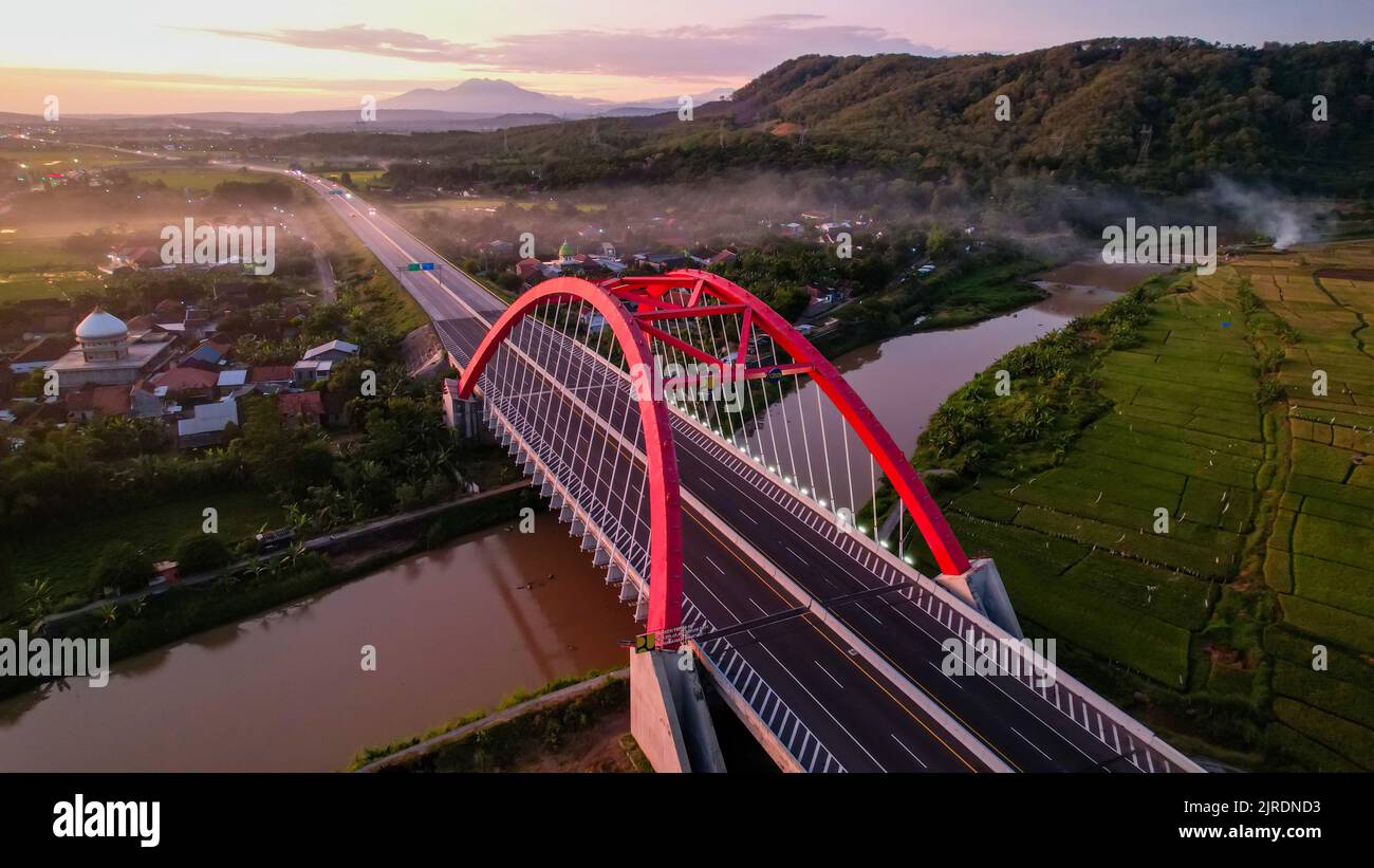 Aerial view of the Kalikuto Bridge, an Iconic Red Bridge at Trans Java ...